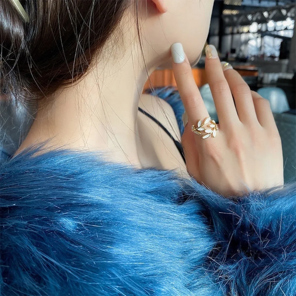 The Secret Pine | Jewelry | Besiana Gold X White Leaf Design Fashion ...